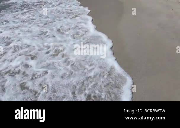 waves on the seashore in slow motion Stock Video Footage - Alamy