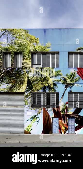 Old factory and industrial complex with paradise palm tree landscapes ...