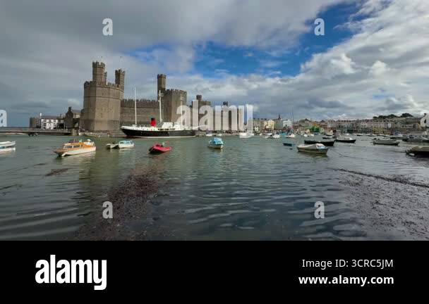 Caernarfon Castle on the north Wales coast. A medieval fortress that ...
