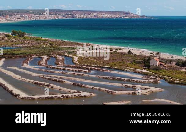 Aerial drone view of traditional salt ponds near Santa Pola, Alicante ...