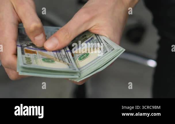 An extremely detailed and closeup view of a pair of hands meticulously ...