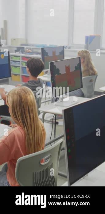Elementary School Children Using Computers, Creating Digital ...