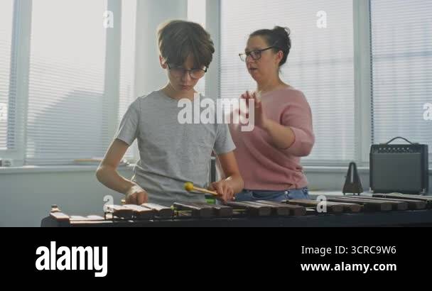 Talented Boy Playing Xylophone During Music Lesson in Elementary School ...