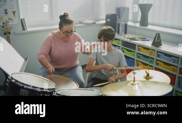 Talented Boy Playing Drums During Percussion Class in Elementary School ...
