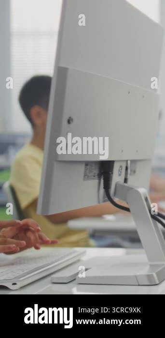 Primary School Students Working on Creative Projects on Computers ...