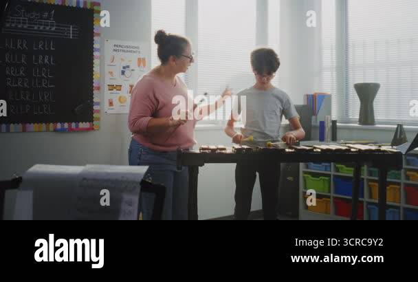 Primary School Boy Practicing Xylophone in Modern Music Class, Dreaming ...