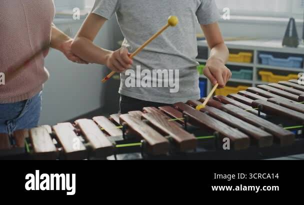 Close Up of Primary School Boy Practicing Xylophone in Modern Music ...