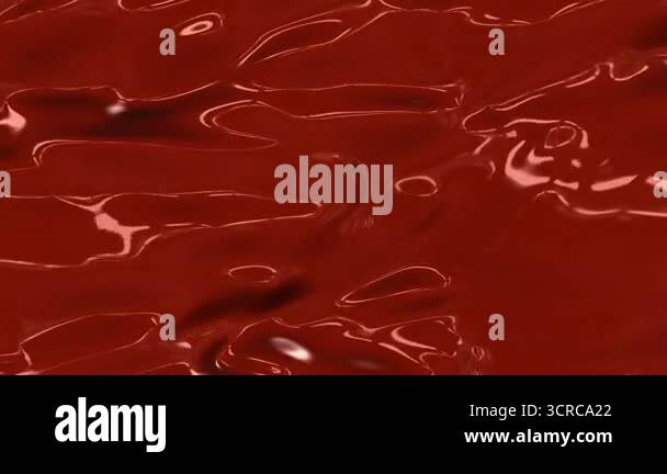 A Close-Up View of Smooth, Reflective Red Fluid Surface Showcasing ...