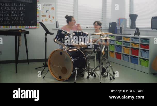 Talented Boy Playing Drums During Percussion Class in Elementary School ...