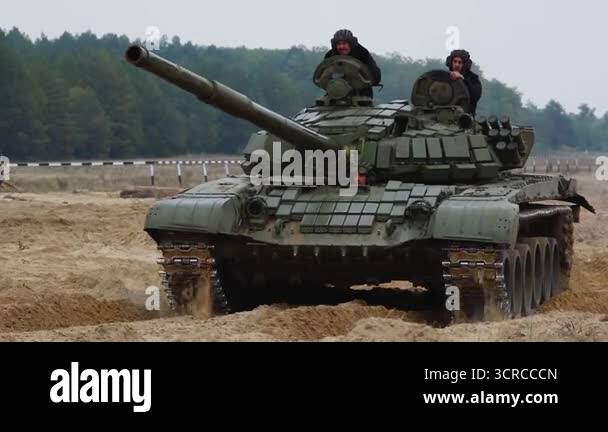Kharkiv, Ukraine - June, 16, 2023: A tank with tankers on a turret ...