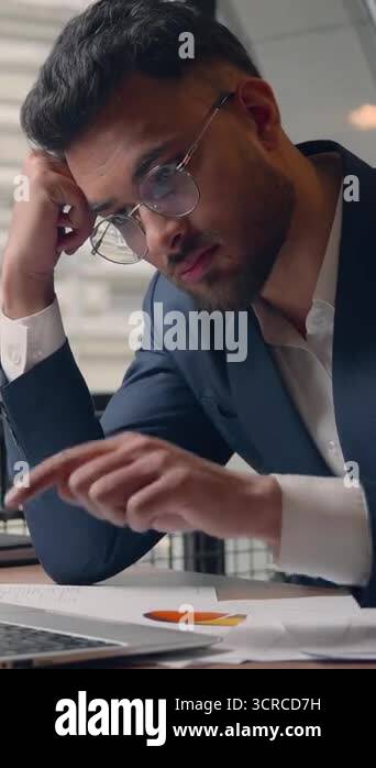 Arabian businessman Indian melancholy frustrated business man typing ...