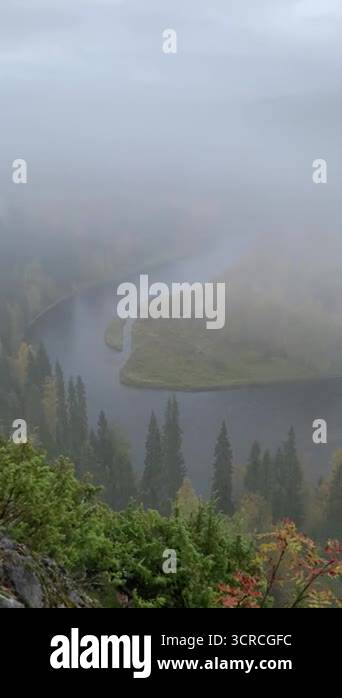 Scenic autumn river bend with misty forest view from Pahkanankallio in ...
