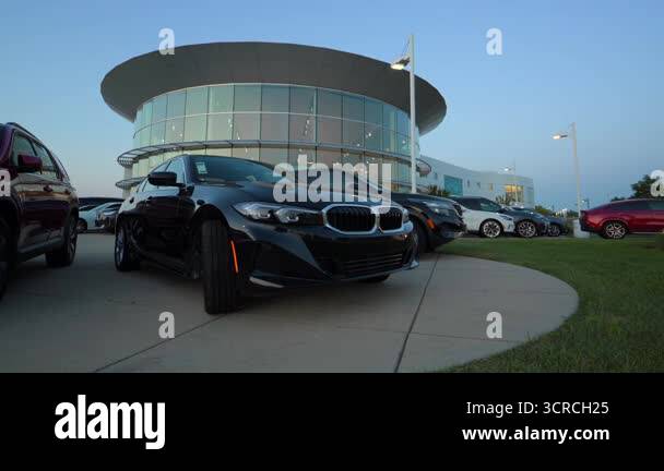 BMW dealership building on twilight sky background. The BMW dealership . September 15th, 2025 ...