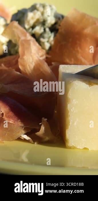 Process of dry-cured prosciutto leg slicing in luxury restaurant ...