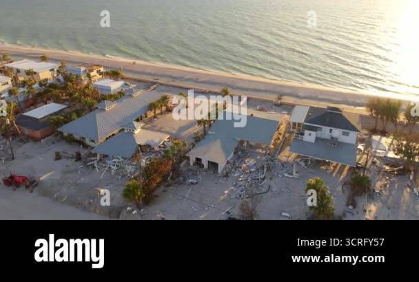 Storm surge severe damage to residential houses on ocean shore after ...