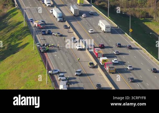 First responders at car accident site in Florida. Emergency services ...