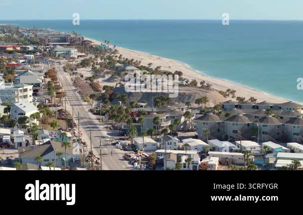 Hurricane Milton aftermath cleanup. Piles of sand at Charlotte County ...