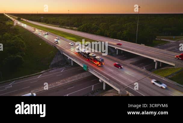 Road network of express lanes and overpasses moving fast vehicle ...