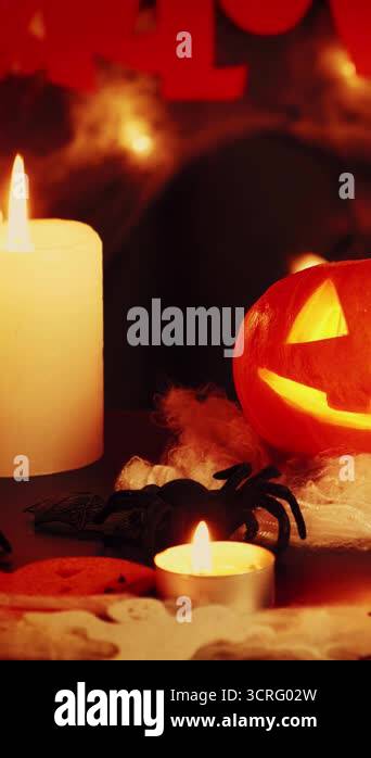 Scary spooky face on carved pumpkin glowing inside. Halloween ...