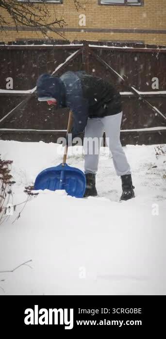 Shoveling snow near house Stock Videos & Footage - HD and 4K Video ...