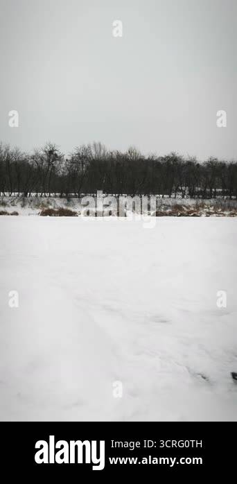 Man is ice skating on skates on frozen thick ice. Male in figure skates ...