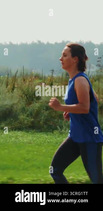 Sporty female athlete jogging Stock Videos & Footage - HD and 4K Video ...