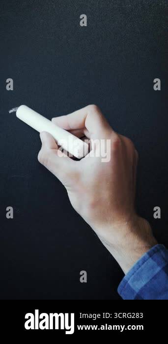 Hand writing number Pi with chalk on chalkboard. Education concept ...