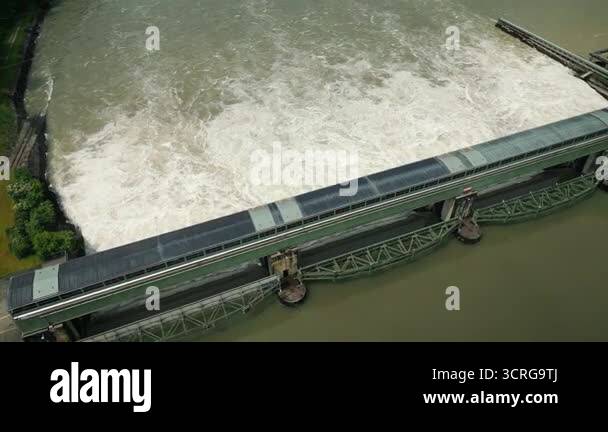Hydroelectric water dam on river Rhine with huge strong water stream ...