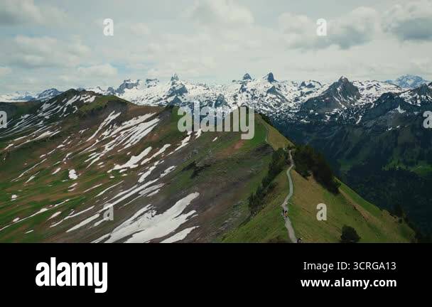Flying over picturesque footpath from Fronalpstock to Klingenstock in ...