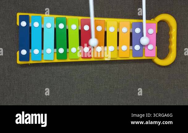 Video on how to play the xylophone with colorful symbols that are ...