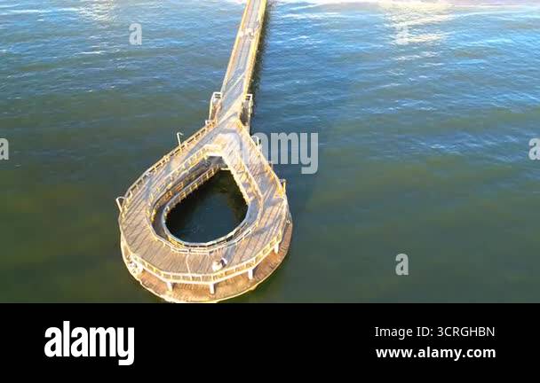 Aerial footage of the iconic wooden pier in Punta del Este, Uruguay ...
