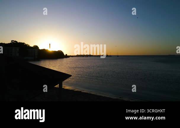 A calm sunset view from the beach in Colonia del Sacramento Uruguay ...