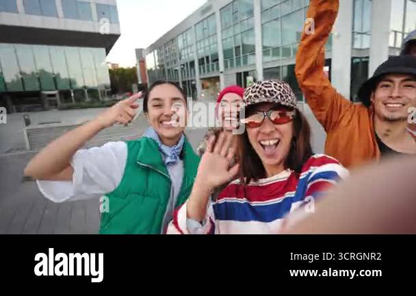 Group of trendy influencer friends taking selfie having fun with with ...