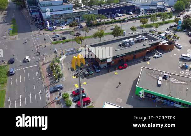 Aerial view of fast food restaurant, gas station shopping complex in ...