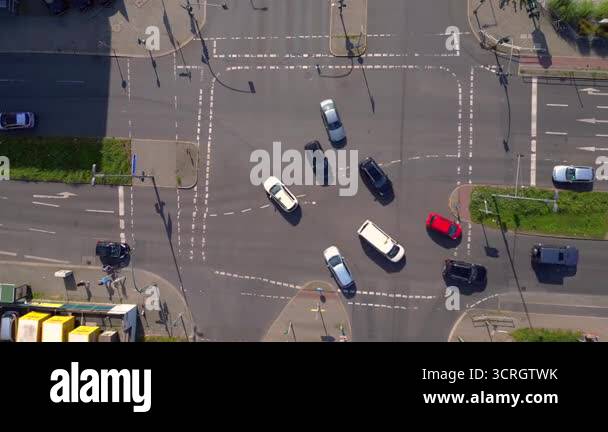 Aerial view of cars navigating a busy Berlin intersection with clear ...