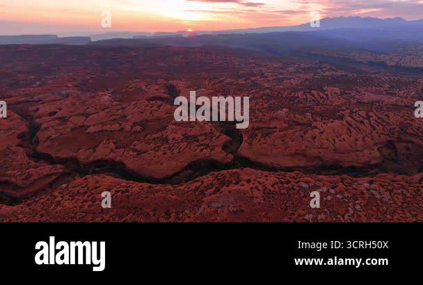 Sunset scenery of the beautiful desert with red landscapes and rocks ...