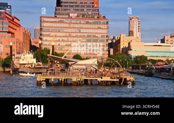 New York, USA, 4 August 2025: Chelsea waterfront with industrial pier ...