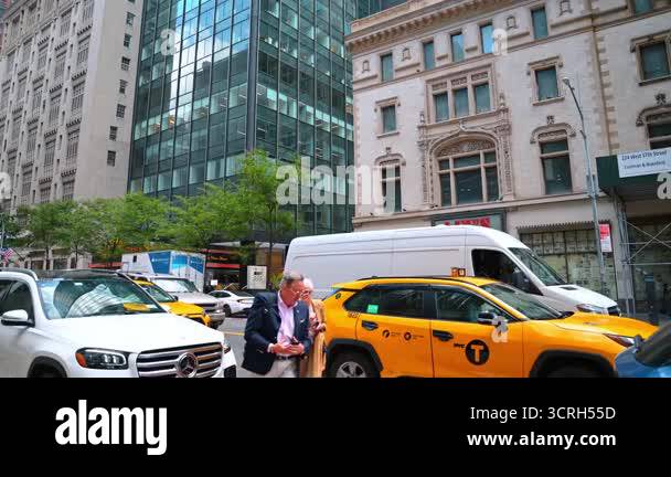 New York, USA, 1 August 2025: Yellow taxis and busy traffic in ...