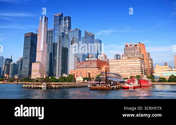 New York, USA, 4 August 2025: Manhattan skyscrapers and Frying Pan ship ...