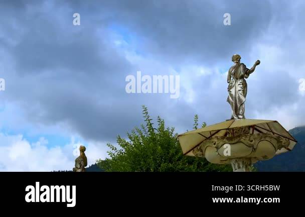 Female statue decorating the exterior of the beautiful building. Low ...