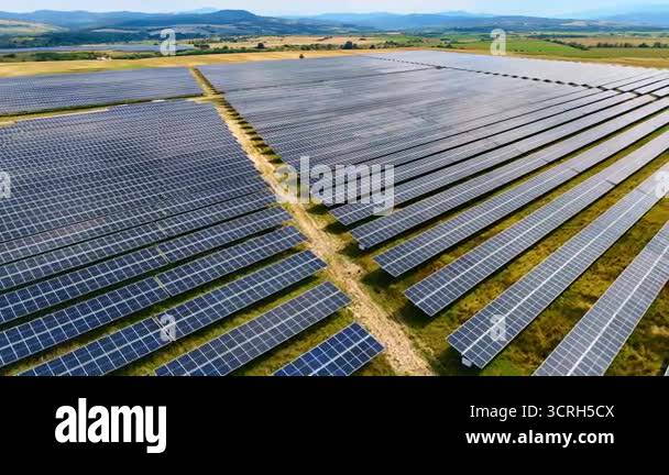 Multiple modern photovoltaic panels facing the sunlight. Solar panels ...