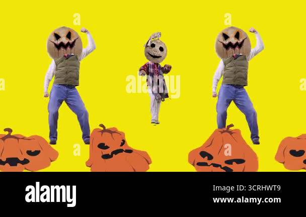 Stop motion animation. People in cardboard pumpkin masks dancing on ...