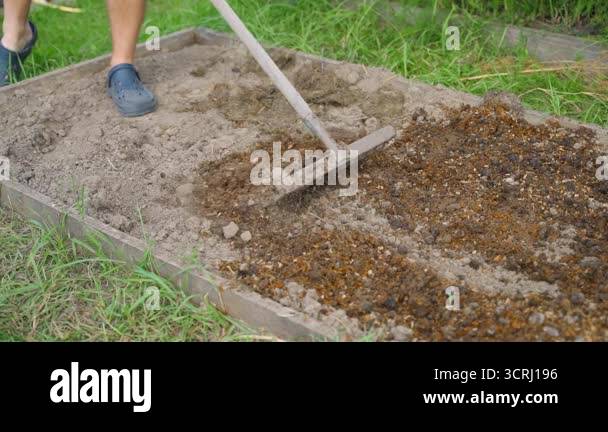 Farmer spreads rake garden Stock Videos & Footage - HD and 4K Video ...