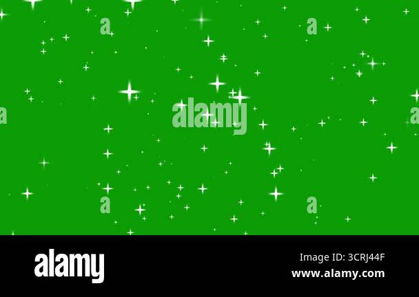 Sparkling white star shapes with soft glowing effects flying on a green ...