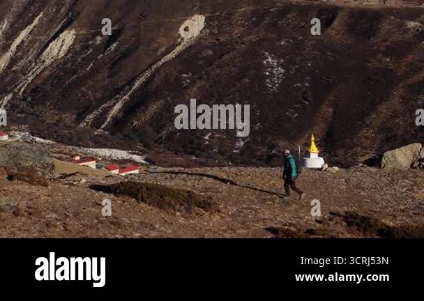 Tracking Shot of a Hiker in the Himalayas of Nepal, Featuring a ...