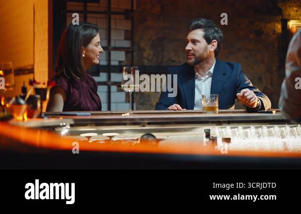 Loving couple having date spending good time in evening bar closeup ...