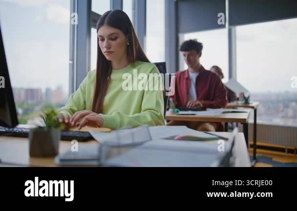 Freelancers focused on laptops work creating project together at ...