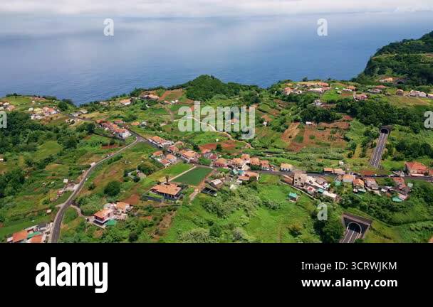 Cozy coastal village sunny day drone view. Wonderful panorama vivid ...