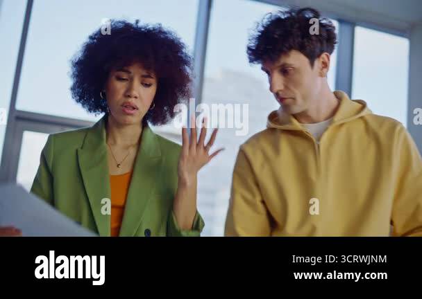 Stressed coworkers reading papers dissatisfied project mistake in ...