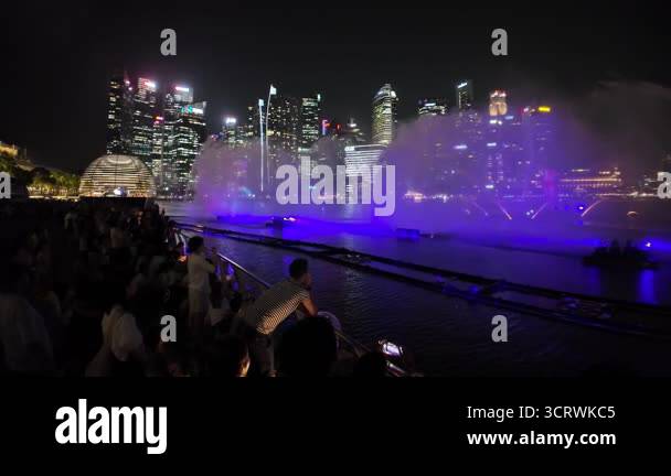 Marina Sand, Singapore - Jul 17 2024: Crowd gathers along the ...